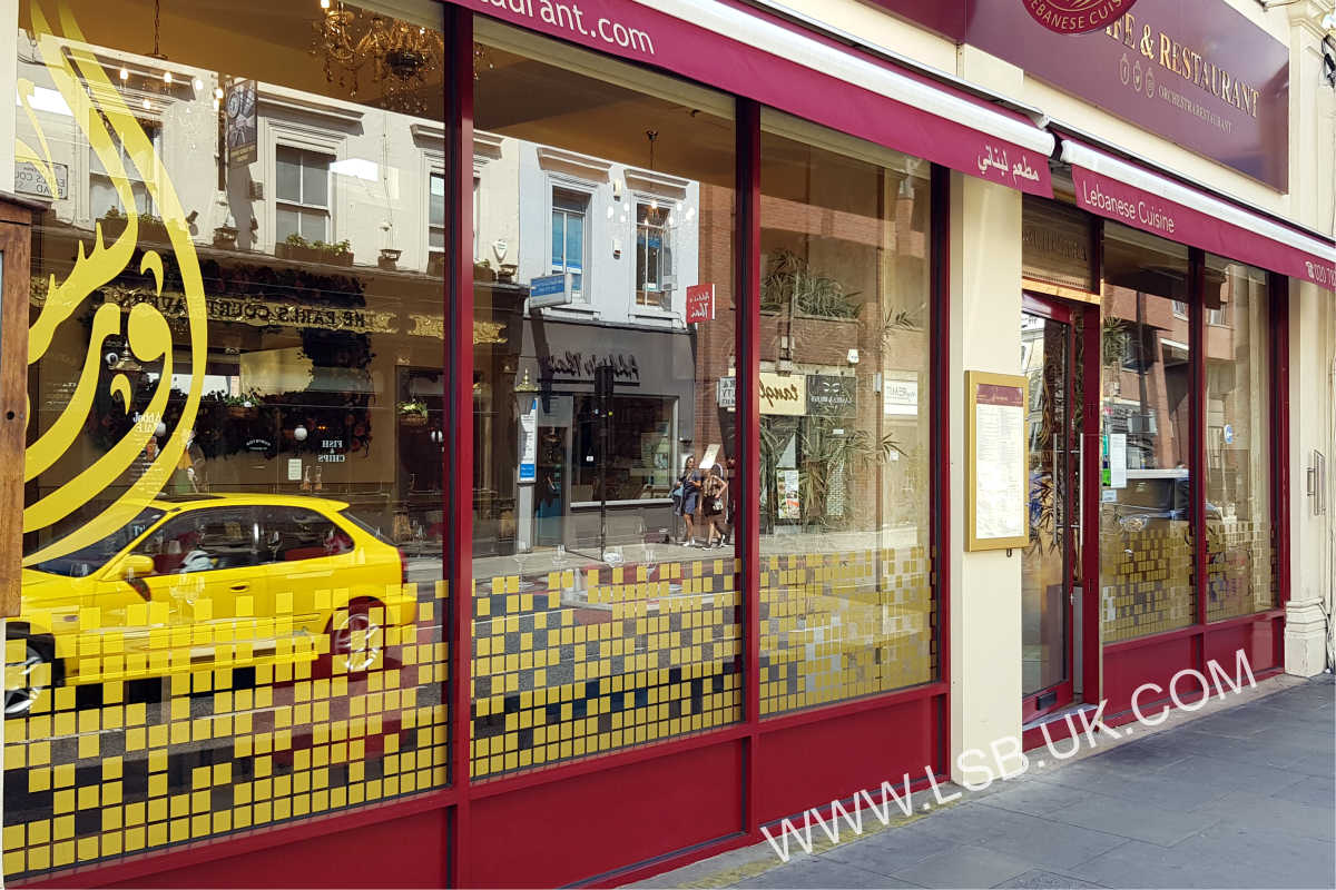 gold vinyl window graphic | Lion Signs & Blinds