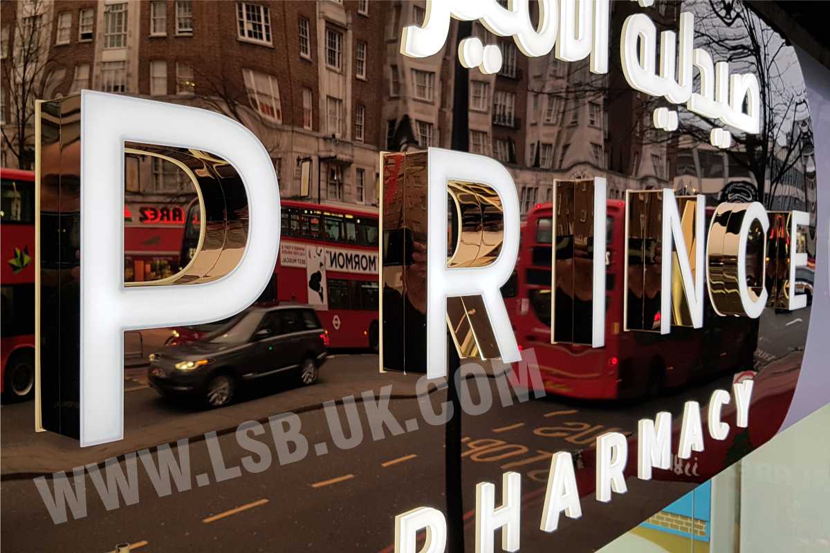 illuminated gold stainless steel letters with gold background | Lion ...